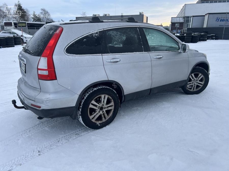 Pelēks Honda CR-V 2012 Marijampole, ar dzinēja tilpumu 2.20 L un nobraukumu 275 tūkst. km par 3800 €, foto 3 vietnē AUTOMOTO.COM.LV