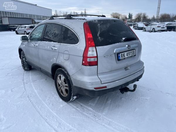Pelēks Honda CR-V 2012 Marijampole, ar dzinēja tilpumu 2.20 L un nobraukumu 275 tūkst. km par 3800 €, foto 4 vietnē AUTOMOTO.COM.LV
