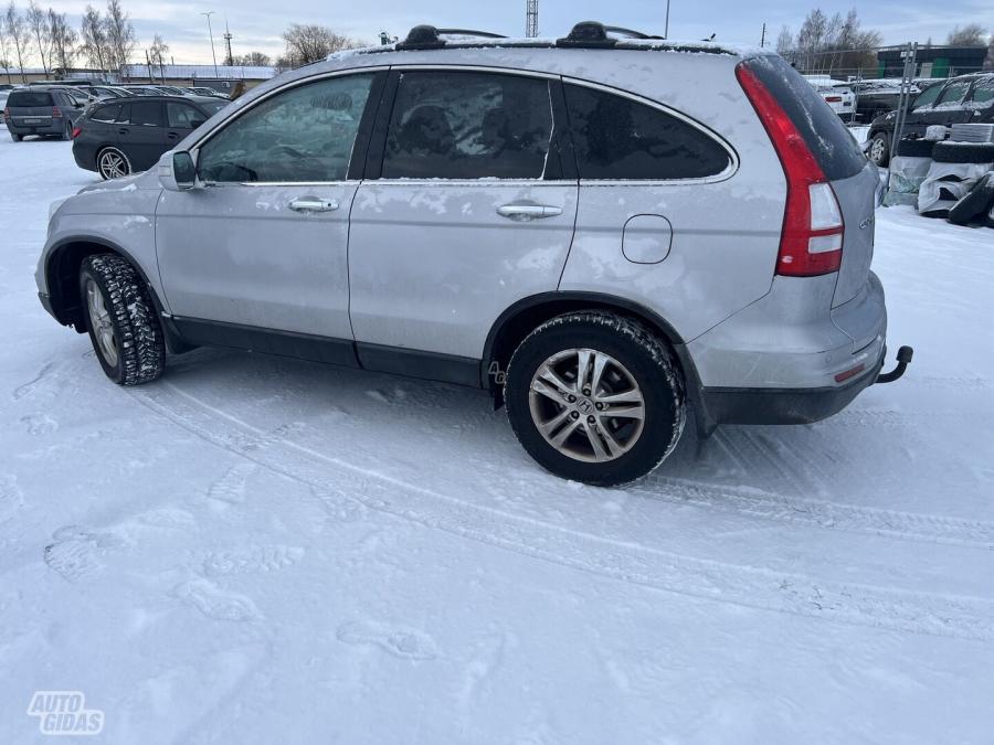 Pelēks Honda CR-V 2012 Marijampole, ar dzinēja tilpumu 2.20 L un nobraukumu 275 tūkst. km par 3800 €, foto 5 vietnē AUTOMOTO.COM.LV