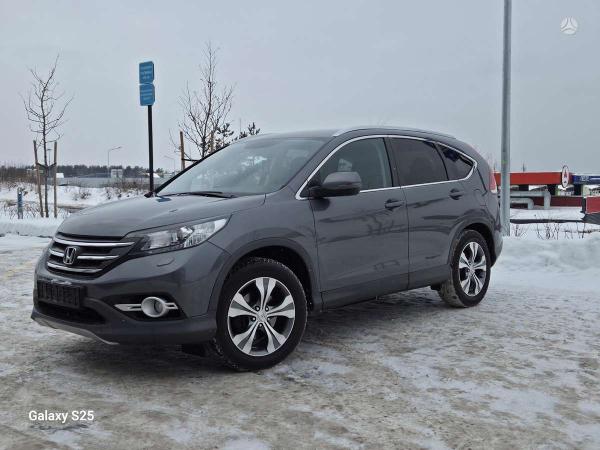 Grey Honda CR-V 2012 in Vilnius, with an engine capacity of 2.20 L and mileage of 280 thousand km for 9990 €, photo 1 on AUTOMOTO.COM.LV