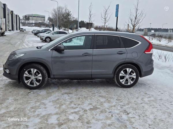 Grey Honda CR-V 2012 in Vilnius, with an engine capacity of 2.20 L and mileage of 280 thousand km for 9990 €, photo 2 on AUTOMOTO.COM.LV