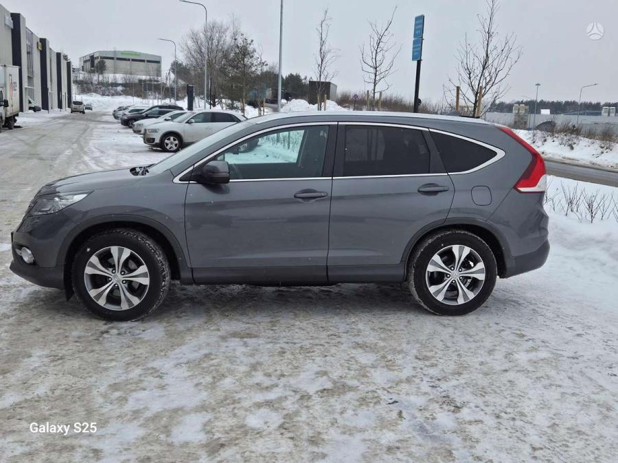 Grey Honda CR-V 2012 in Vilnius, with an engine capacity of 2.20 L and mileage of 280 thousand km for 9990 €, photo 2 on AUTOMOTO.COM.LV