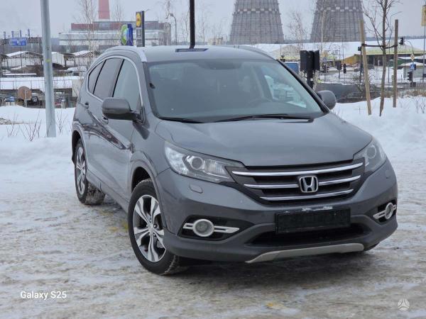 Grey Honda CR-V 2012 in Vilnius, with an engine capacity of 2.20 L and mileage of 280 thousand km for 9990 €, photo 3 on AUTOMOTO.COM.LV