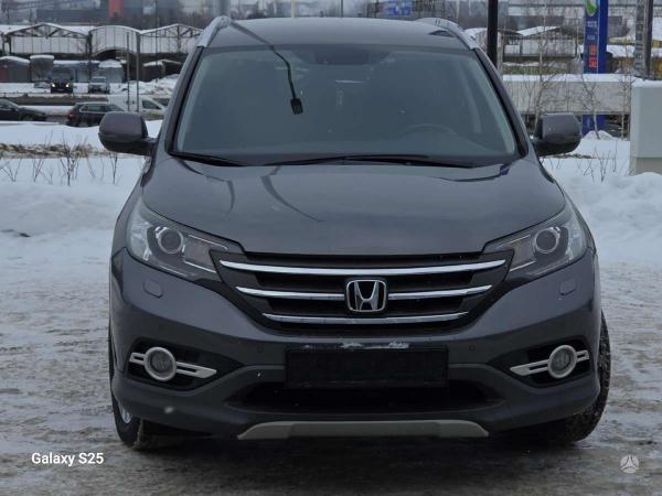 Grey Honda CR-V 2012 in Vilnius, with an engine capacity of 2.20 L and mileage of 280 thousand km for 9990 €, photo 4 on AUTOMOTO.COM.LV