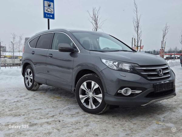 Grey Honda CR-V 2012 in Vilnius, with an engine capacity of 2.20 L and mileage of 280 thousand km for 9990 €, photo 5 on AUTOMOTO.COM.LV