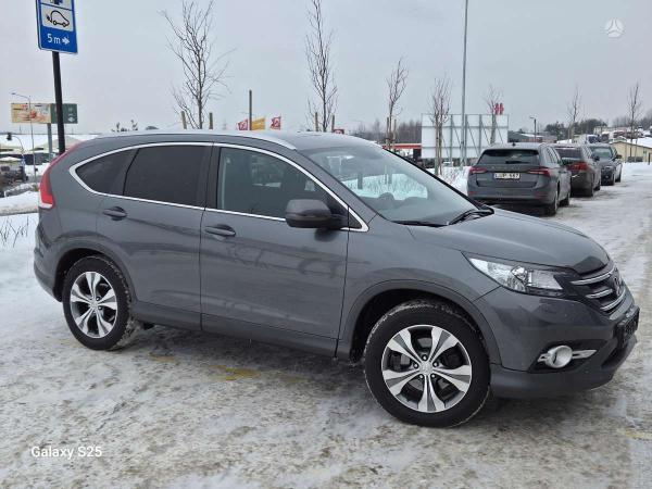 Grey Honda CR-V 2012 in Vilnius, with an engine capacity of 2.20 L and mileage of 280 thousand km for 9990 €, photo 6 on AUTOMOTO.COM.LV