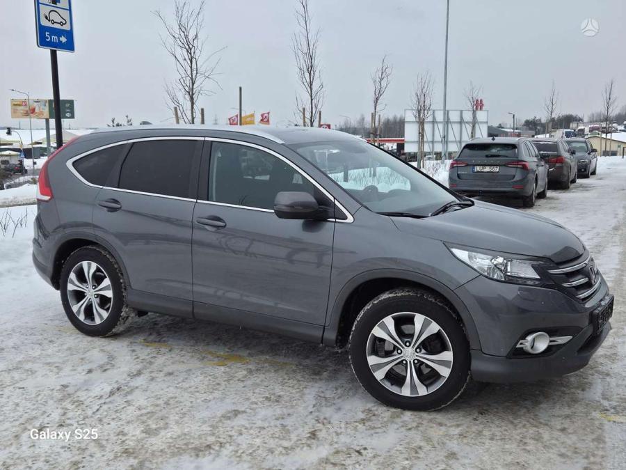 Grey Honda CR-V 2012 in Vilnius, with an engine capacity of 2.20 L and mileage of 280 thousand km for 9990 €, photo 6 on AUTOMOTO.COM.LV