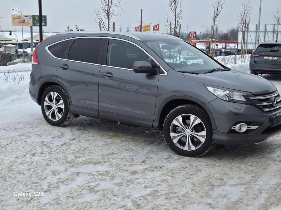 Grey Honda CR-V 2012 in Vilnius, with an engine capacity of 2.20 L and mileage of 280 thousand km for 9990 €, photo 7 on AUTOMOTO.COM.LV