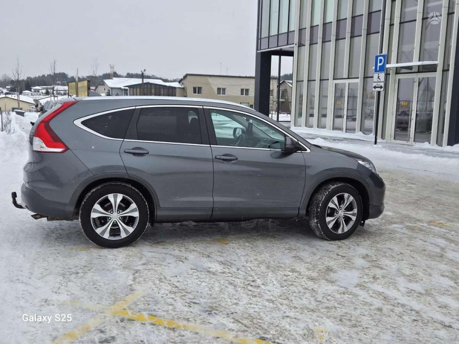 Grey Honda CR-V 2012 in Vilnius, with an engine capacity of 2.20 L and mileage of 280 thousand km for 9990 €, photo 8 on AUTOMOTO.COM.LV