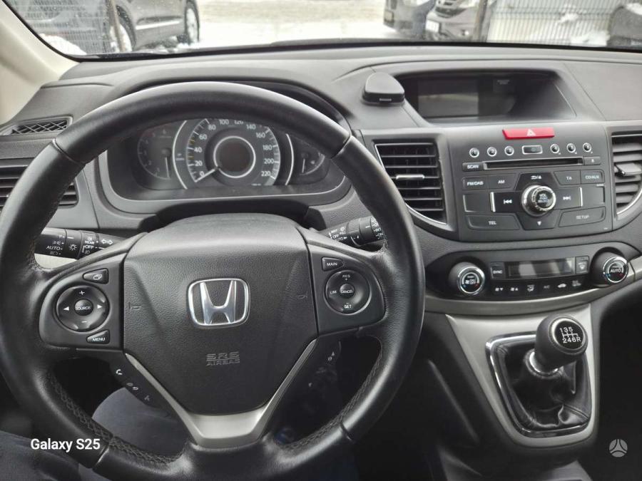 Grey Honda CR-V 2012 in Vilnius, with an engine capacity of 2.20 L and mileage of 280 thousand km for 9990 €, photo 17 on AUTOMOTO.COM.LV