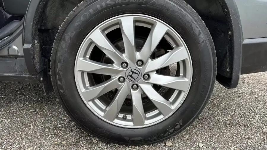 Pelēks Honda CR-V 2012 Daugavpils, ar dzinēja tilpumu 2.20 L un nobraukumu 299 tūkst. km par 7770 €, foto 31 vietnē AUTOMOTO.COM.LV