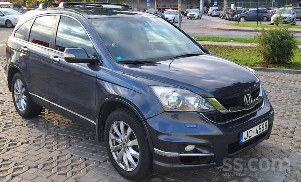 Grey Honda CR-V 2012 in Riga, with an engine capacity of 2.00 L and mileage of 215 thousand km for 7450 €, photo 2 on AUTOMOTO.COM.LV