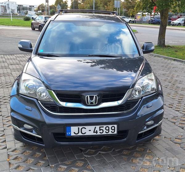 Grey Honda CR-V 2012 in Riga, with an engine capacity of 2.00 L and mileage of 215 thousand km for 7450 €, photo 5 on AUTOMOTO.COM.LV