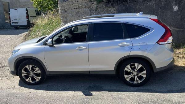 Pelēks Honda CR-V 2012 Tauragė, ar dzinēja tilpumu 2.20 L un nobraukumu 256 tūkst. km par 8900 €, foto 2 vietnē AUTOMOTO.COM.LV