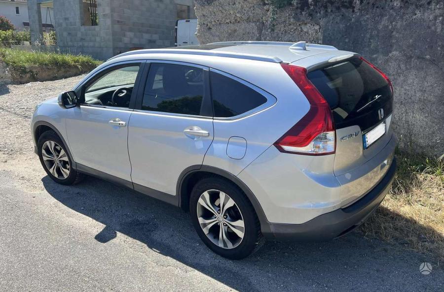 Grey Honda CR-V 2012 in Taurage, with an engine capacity of 2.20 L and mileage of 256 thousand km for 8900 €, photo 4 on AUTOMOTO.COM.LV