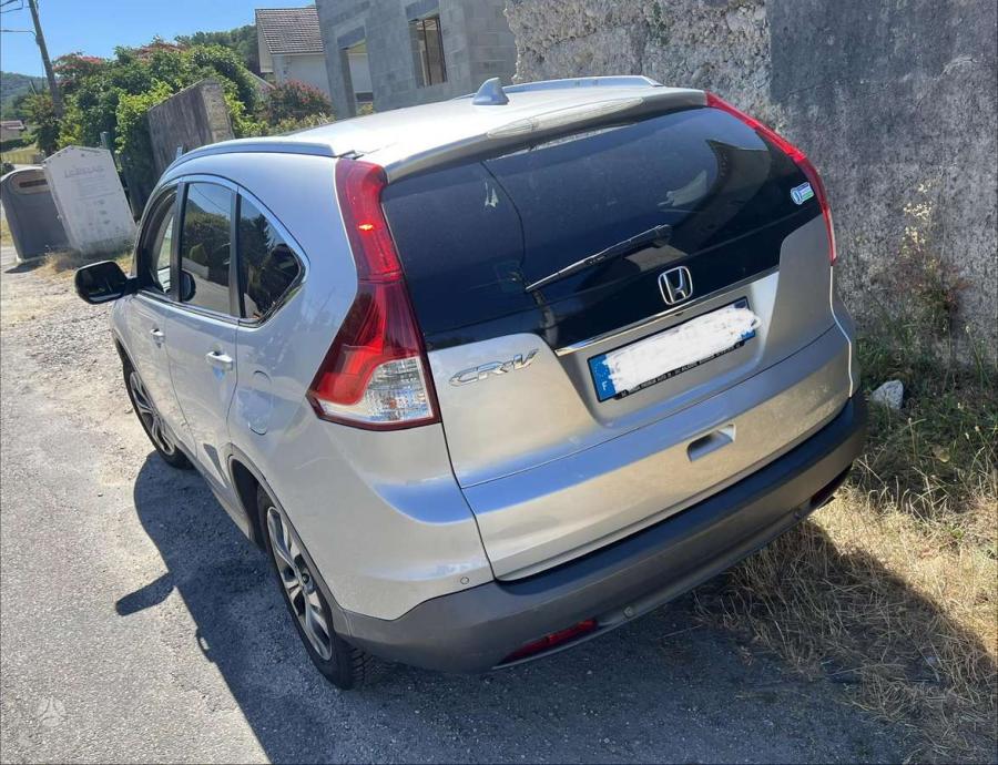 Grey Honda CR-V 2012 in Taurage, with an engine capacity of 2.20 L and mileage of 256 thousand km for 8900 €, photo 5 on AUTOMOTO.COM.LV