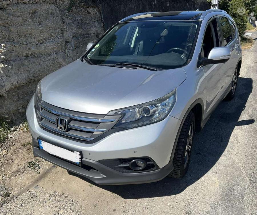 Grey Honda CR-V 2012 in Taurage, with an engine capacity of 2.20 L and mileage of 256 thousand km for 8900 €, photo 6 on AUTOMOTO.COM.LV