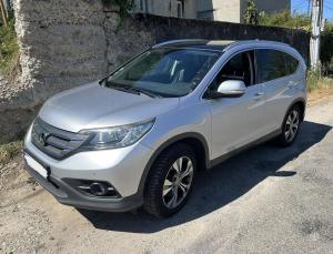 Grey Honda CR-V 2012 in Taurage, with an engine capacity of 2.20 L and mileage of 256 thousand km for 8900 €, photo 7 on AUTOMOTO.COM.LV