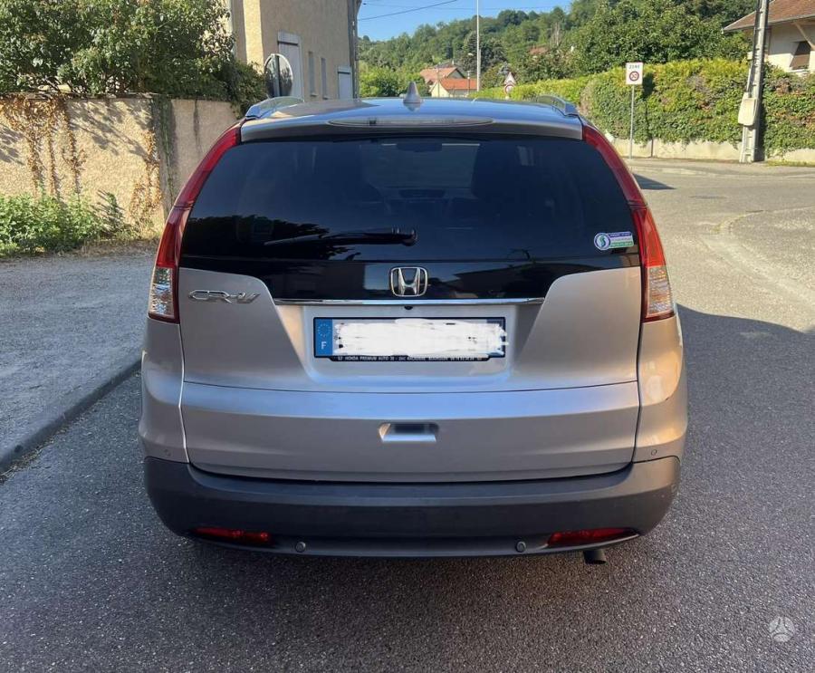 Grey Honda CR-V 2012 in Taurage, with an engine capacity of 2.20 L and mileage of 256 thousand km for 8900 €, photo 8 on AUTOMOTO.COM.LV