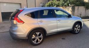 Grey Honda CR-V 2012 in Taurage, with an engine capacity of 2.20 L and mileage of 256 thousand km for 8900 €, photo 9 on AUTOMOTO.COM.LV