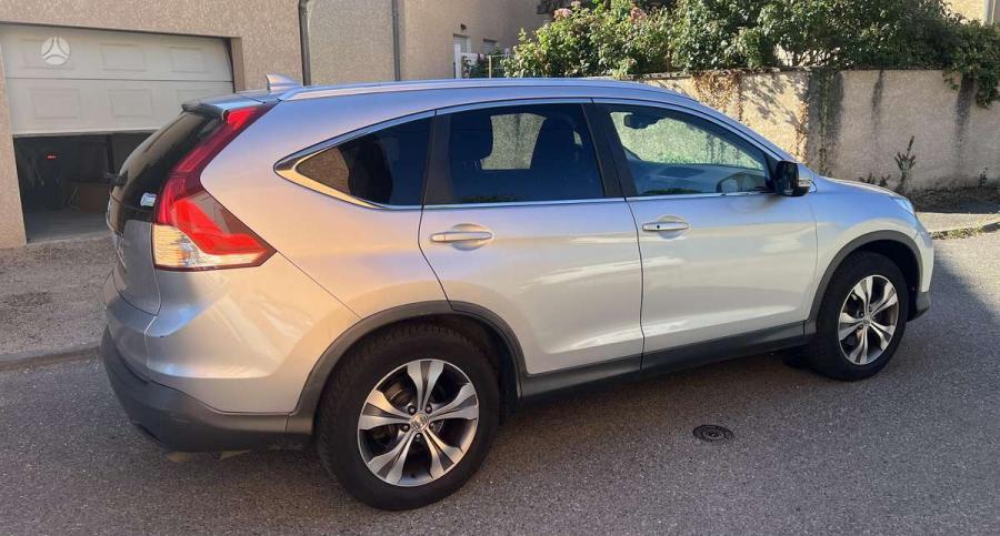 Grey Honda CR-V 2012 in Taurage, with an engine capacity of 2.20 L and mileage of 256 thousand km for 8900 €, photo 9 on AUTOMOTO.COM.LV