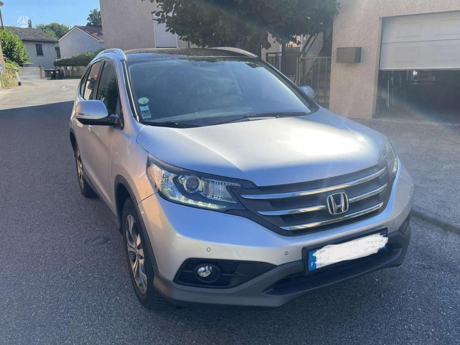 Grey Honda CR-V 2012 in Taurage, with an engine capacity of 2.20 L and mileage of 256 thousand km for 8900 €, photo 10 on AUTOMOTO.COM.LV