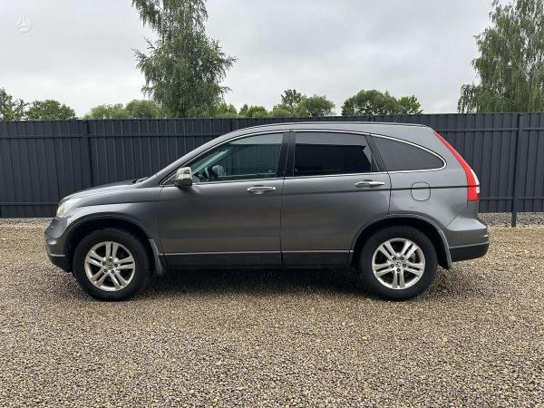 Grey Honda CR-V 2012 in Pasvalys, with an engine capacity of 2.20 L and mileage of 611 thousand km for 4700 €, photo 2 on AUTOMOTO.COM.LV