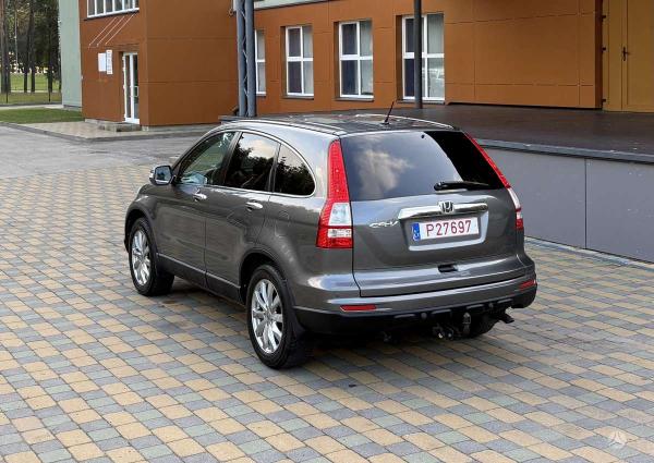 Pelēks Honda CR-V 2012 Druskininkai, ar dzinēja tilpumu 2.20 L un nobraukumu 284 tūkst. km par 7700 €, foto 6 vietnē AUTOMOTO.COM.LV