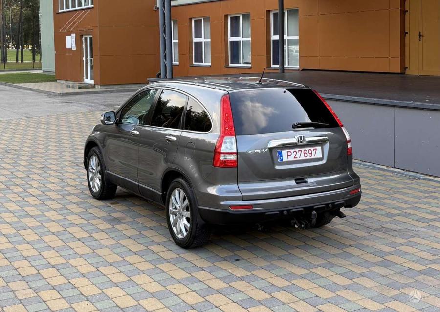Grey Honda CR-V 2012 in Druskininkai, with an engine capacity of 2.20 L and mileage of 284 thousand km for 7700 €, photo 7 on AUTOMOTO.COM.LV