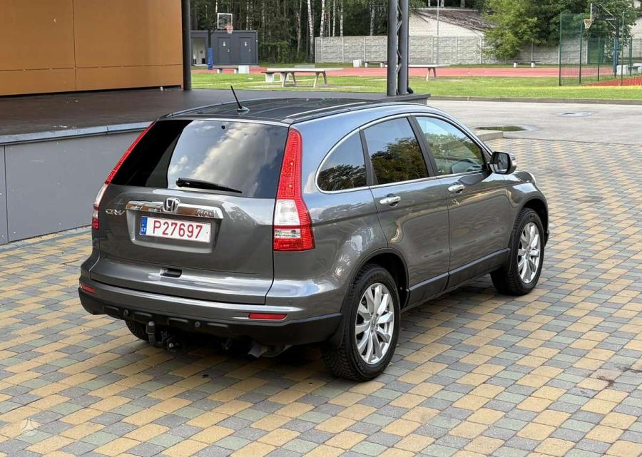 Grey Honda CR-V 2012 in Druskininkai, with an engine capacity of 2.20 L and mileage of 284 thousand km for 7700 €, photo 9 on AUTOMOTO.COM.LV