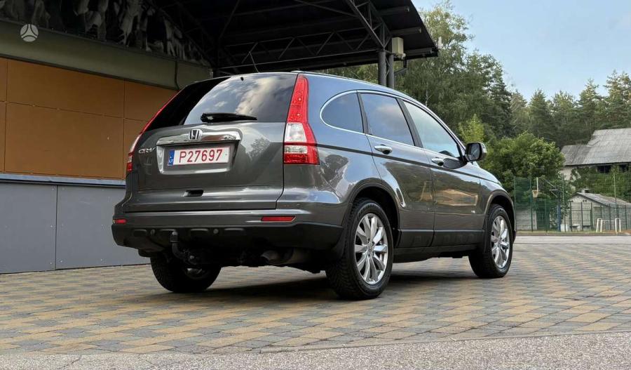 Grey Honda CR-V 2012 in Druskininkai, with an engine capacity of 2.20 L and mileage of 284 thousand km for 7700 €, photo 16 on AUTOMOTO.COM.LV