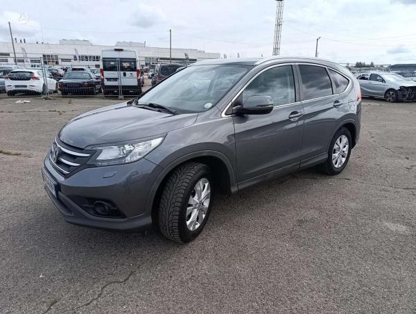 Grey Honda CR-V 2012 in Panevezys, with an engine capacity of 2.20 L and mileage of 250 thousand km for 8900 €, photo 1 on AUTOMOTO.COM.LV