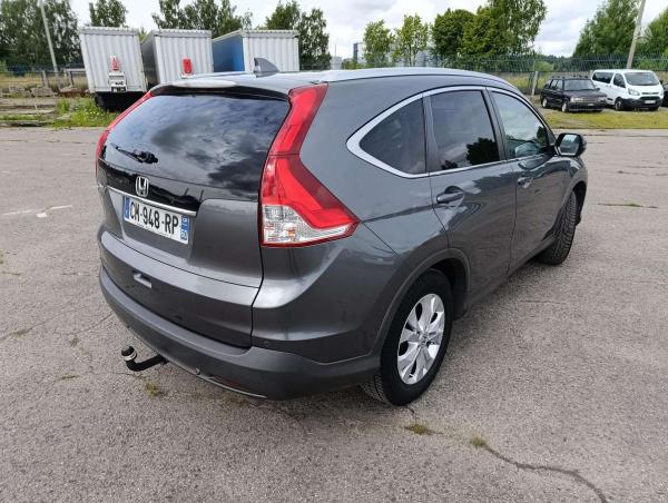 Grey Honda CR-V 2012 in Panevezys, with an engine capacity of 2.20 L and mileage of 250 thousand km for 8900 €, photo 4 on AUTOMOTO.COM.LV