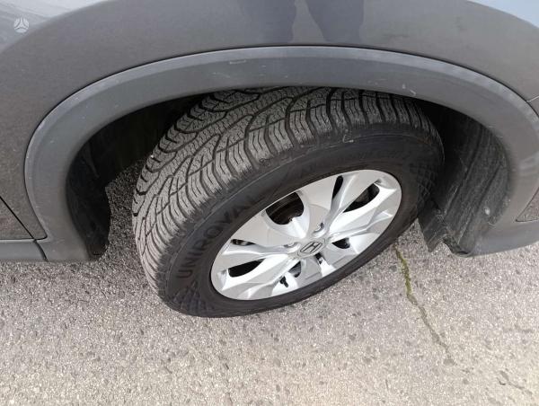 Grey Honda CR-V 2012 in Panevezys, with an engine capacity of 2.20 L and mileage of 250 thousand km for 8900 €, photo 6 on AUTOMOTO.COM.LV