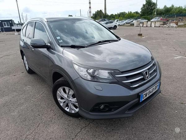 Grey Honda CR-V 2012 in Panevezys, with an engine capacity of 2.20 L and mileage of 250 thousand km for 8900 €, photo 7 on AUTOMOTO.COM.LV