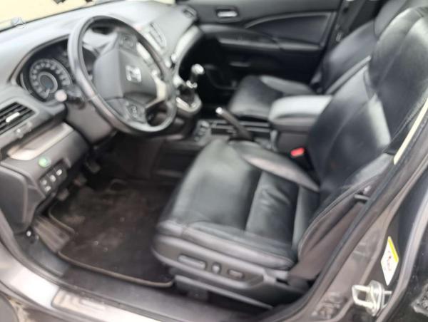 Grey Honda CR-V 2012 in Panevezys, with an engine capacity of 2.20 L and mileage of 250 thousand km for 8900 €, photo 10 on AUTOMOTO.COM.LV