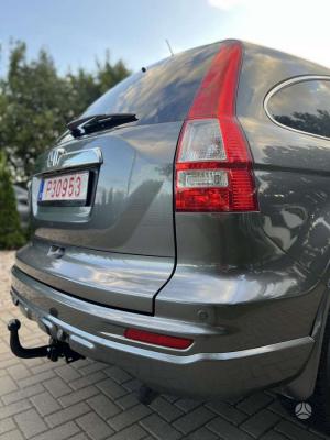 Pelēks Honda CR-V 2012 Druskininkai, ar dzinēja tilpumu 2.20 L un nobraukumu 259 tūkst. km par 7890 €, foto 17 vietnē AUTOMOTO.COM.LV