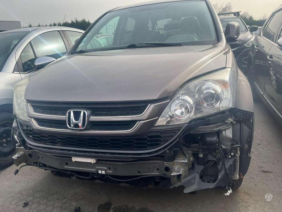 Grey Honda CR-V 2012 in Taurage, with an engine capacity of 2.20 L and mileage of 187 thousand km for 5500 €, photo 3 on AUTOMOTO.COM.LV