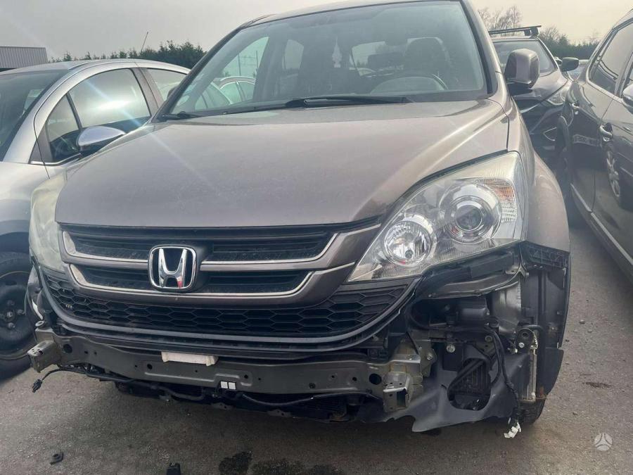Pelēks Honda CR-V 2012 Tauragė, ar dzinēja tilpumu 2.20 L un nobraukumu 187 tūkst. km par 5500 €, foto 3 vietnē AUTOMOTO.COM.LV