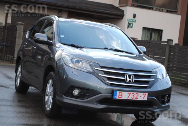 Grey Honda CR-V 2012 in Riga, with an engine capacity of 2.20 L and mileage of 239 thousand km for 10490 €, photo 5 on AUTOMOTO.COM.LV