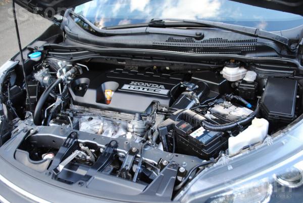 Grey Honda CR-V 2012 in Riga, with an engine capacity of 2.20 L and mileage of 239 thousand km for 10490 €, photo 6 on AUTOMOTO.COM.LV