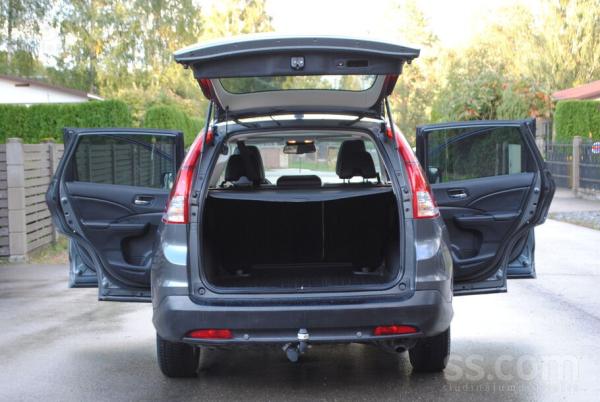 Grey Honda CR-V 2012 in Riga, with an engine capacity of 2.20 L and mileage of 239 thousand km for 10490 €, photo 8 on AUTOMOTO.COM.LV