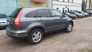 Grey Honda CR-V 2012 in Daugavpils, with an engine capacity of 2.20 L and mileage of 0 thousand km for 7850 €, photo 7 on AUTOMOTO.COM.LV
