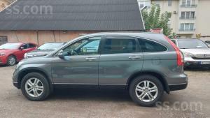 Grey Honda CR-V 2012 in Daugavpils, with an engine capacity of 2.20 L and mileage of 0 thousand km for 7850 €, photo 11 on AUTOMOTO.COM.LV
