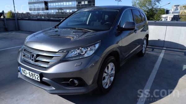 Grey Honda CR-V 2013 in Riga, with an engine capacity of 2.00 L and mileage of 210 thousand km for 5000 €, photo 1 on AUTOMOTO.COM.LV