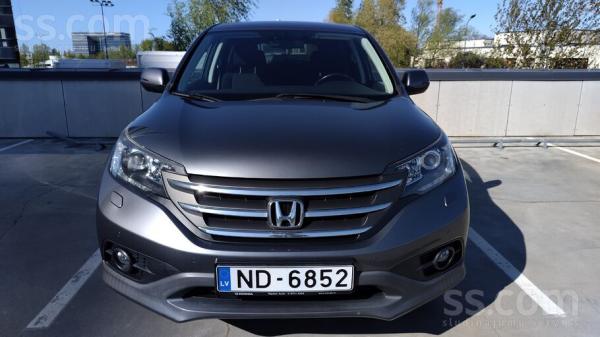 Grey Honda CR-V 2013 in Riga, with an engine capacity of 2.00 L and mileage of 210 thousand km for 5000 €, photo 2 on AUTOMOTO.COM.LV