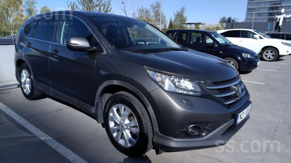 Grey Honda CR-V 2013 in Riga, with an engine capacity of 2.00 L and mileage of 210 thousand km for 5000 €, photo 3 on AUTOMOTO.COM.LV
