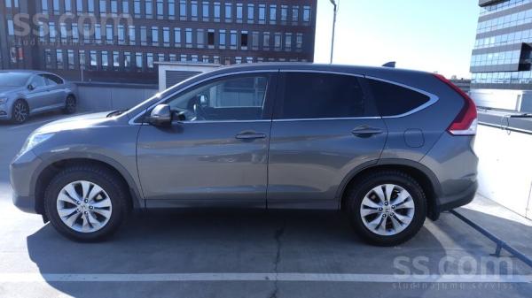 Grey Honda CR-V 2013 in Riga, with an engine capacity of 2.00 L and mileage of 210 thousand km for 5000 €, photo 8 on AUTOMOTO.COM.LV