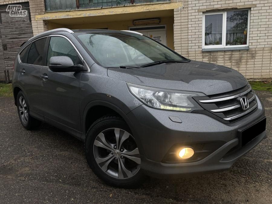 Grey Honda CR-V 2013 in Marijampole, with an engine capacity of 1.60 L and mileage of 238 thousand km for 7999 €, photo 1 on AUTOMOTO.COM.LV