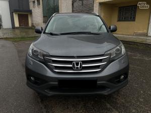 Grey Honda CR-V 2013 in Marijampole, with an engine capacity of 1.60 L and mileage of 238 thousand km for 7999 €, photo 2 on AUTOMOTO.COM.LV